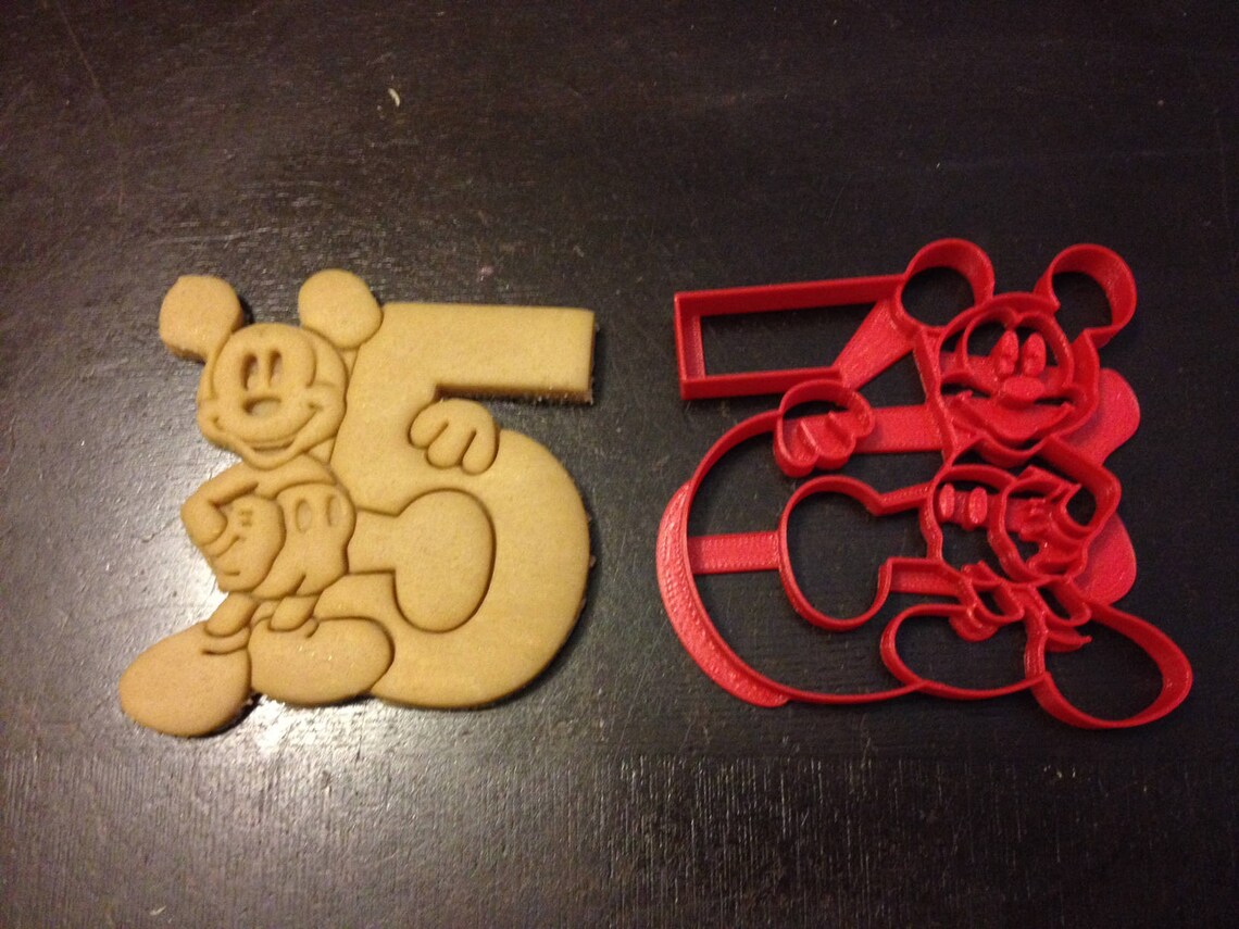 Mickey Mouse Cookie Cutter. Holding the Number 5 for Fifth Year ...
