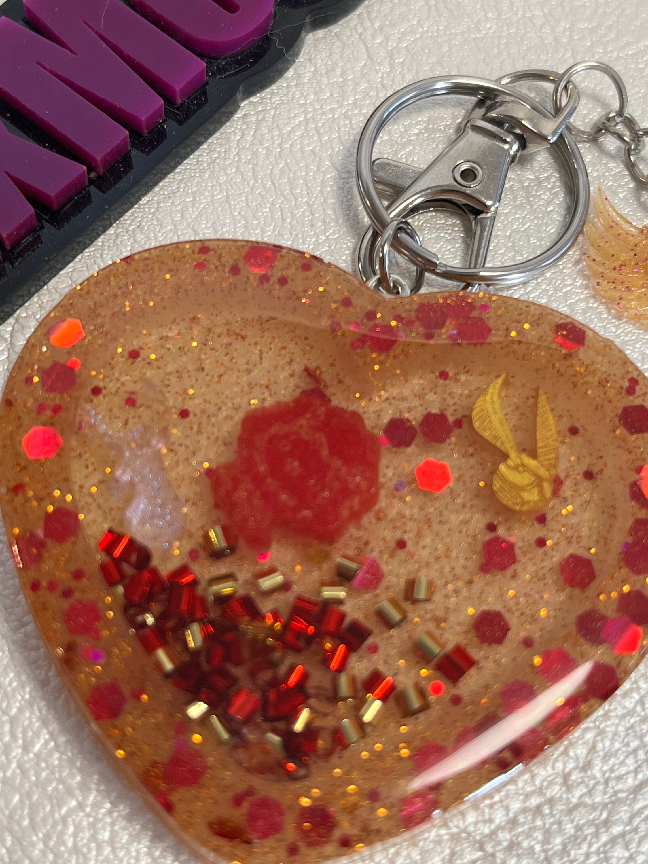 Red and Gold Liquid Shaker Heart Resin Keychain With H.P. Brave House ...