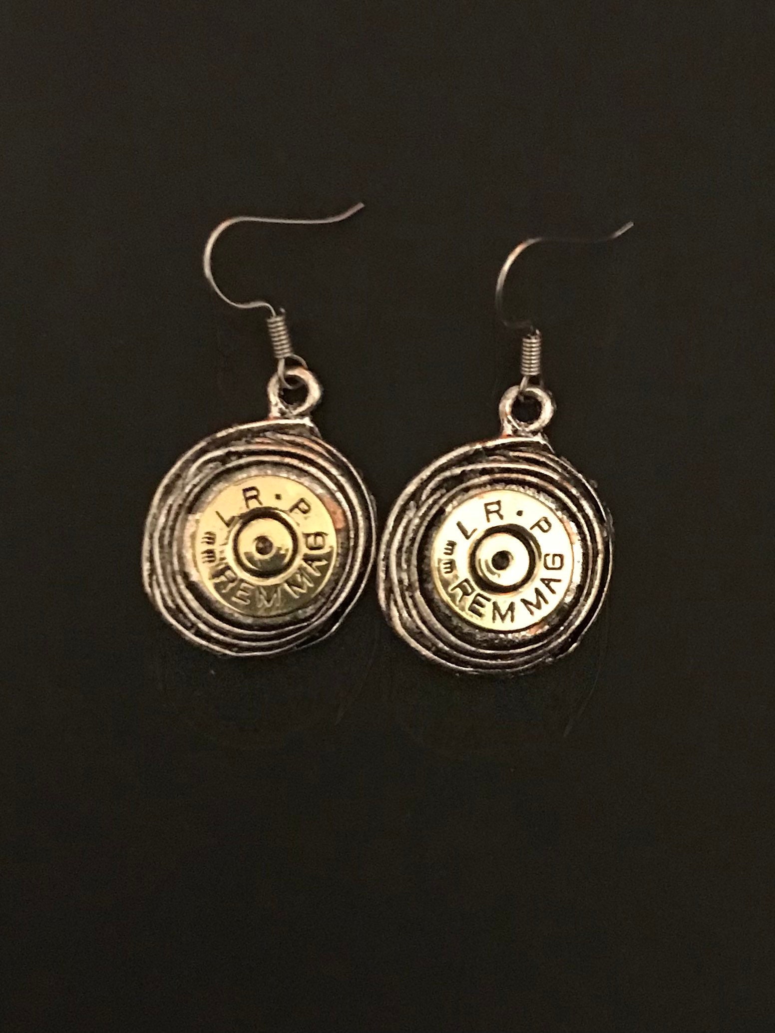 Bullet casing earrings .7mm Remington Mag round earrings | Etsy