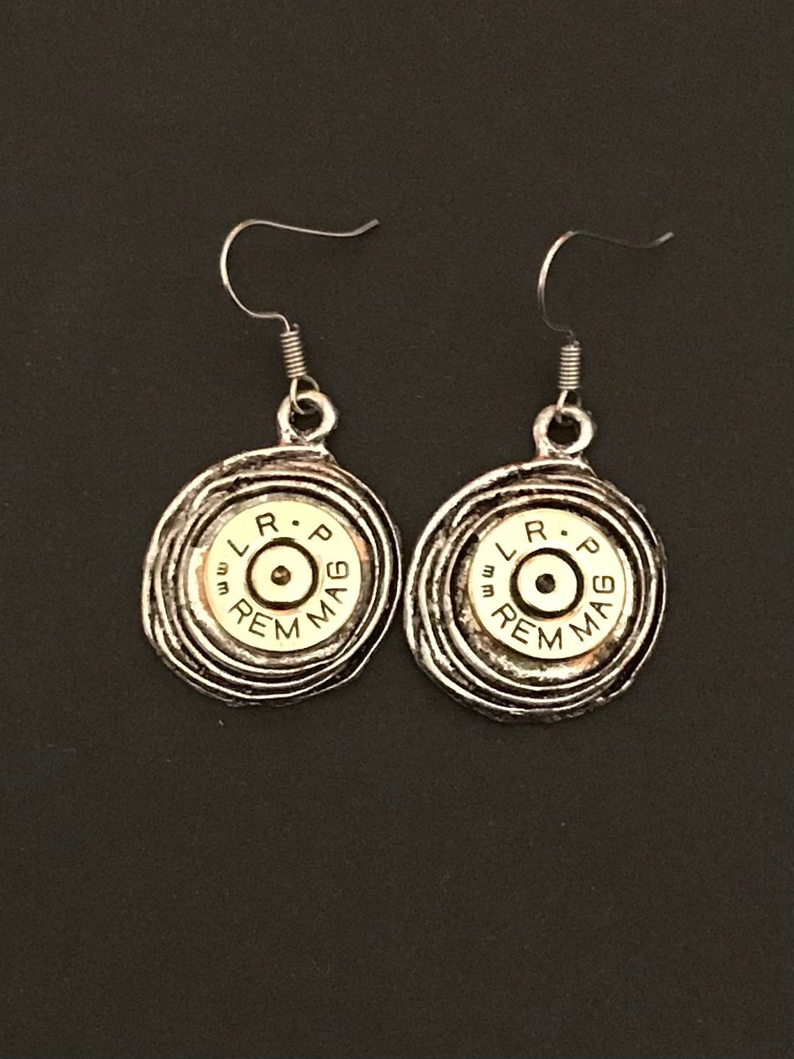 Bullet casing earrings .7mm Remington Mag round earrings | Etsy