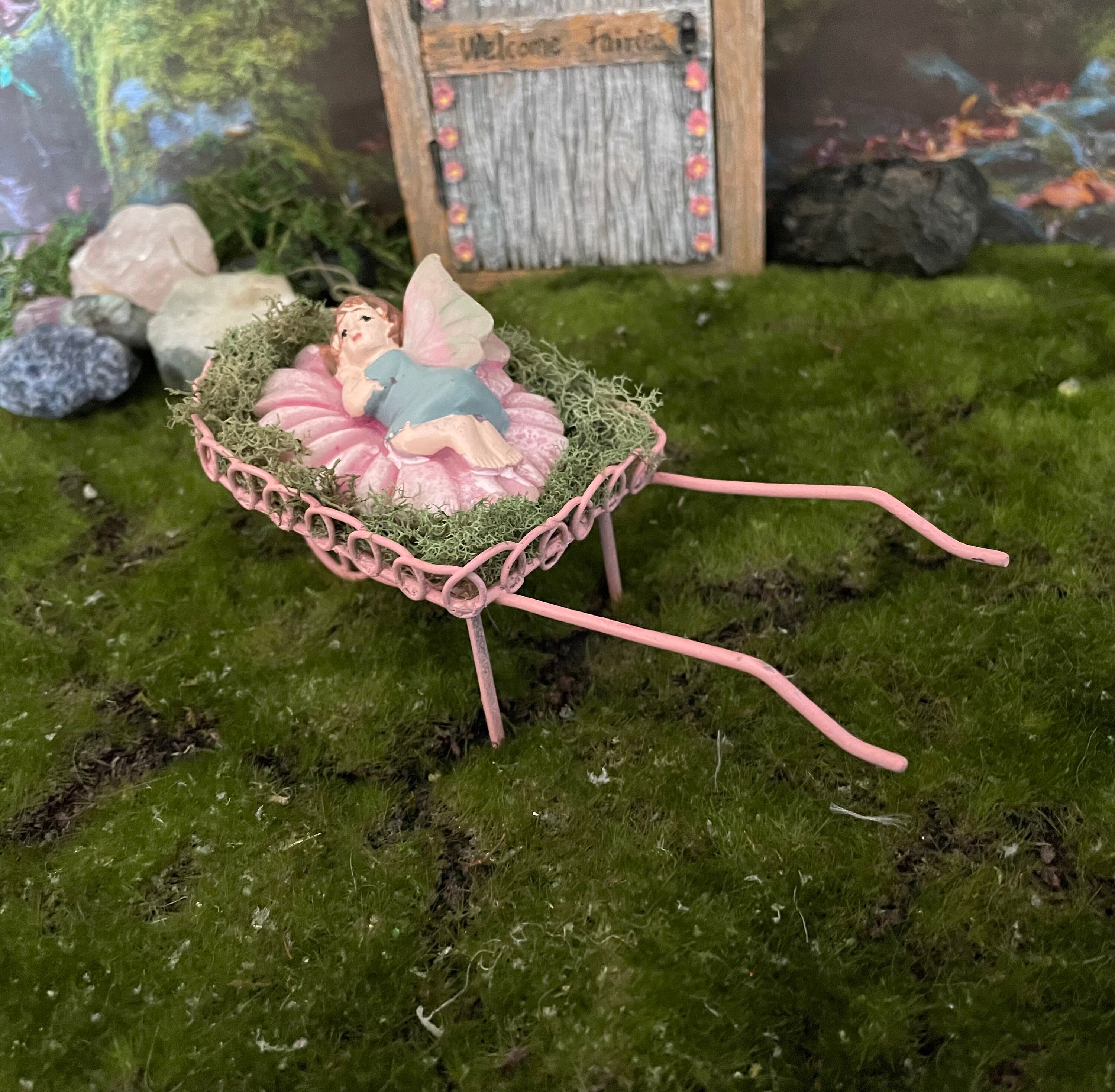 Sweet Fairy Sleeping Inside a Pretty Pink Wheelbarrow is the Perfect ...