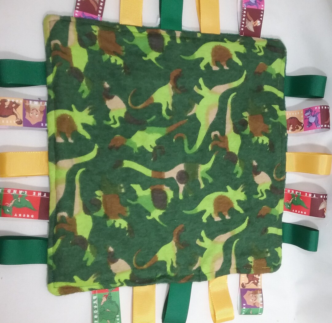 Taggie GREEN Dinosaurs Fabric Soft Green Fleece Lots Dino Ribbons Baby ...