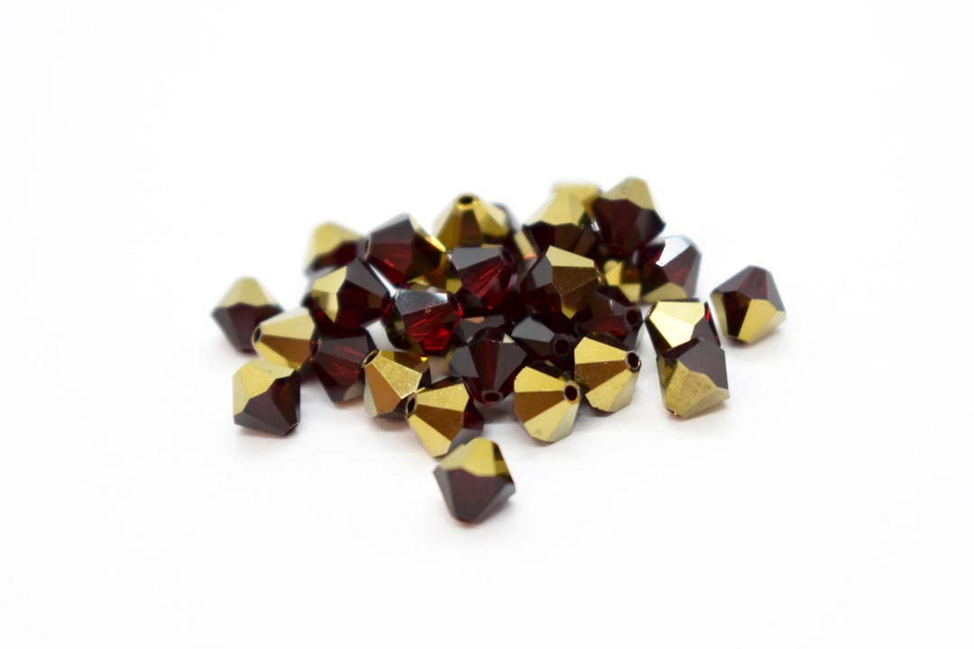 Siam Dorado Swarovski Crystal Bicone Beads 5301/5328 6mm Red & Gold ...