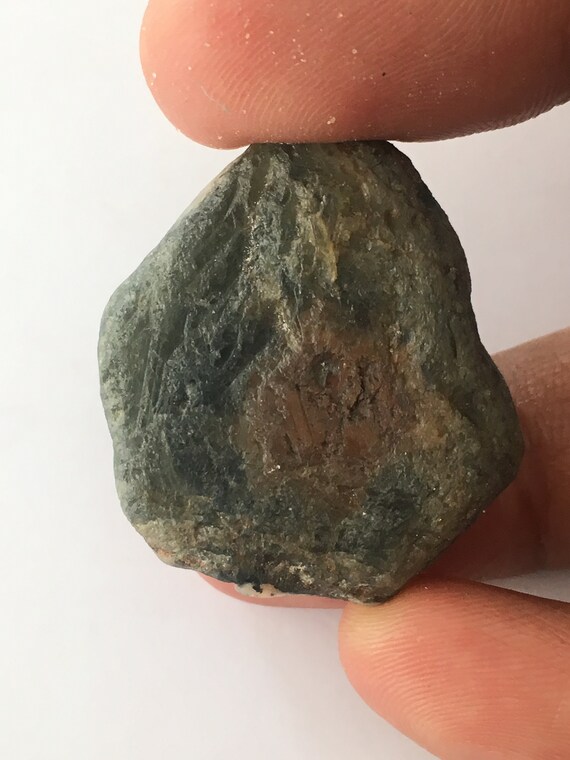 Gemstones Jewelry & Beauty Green sapphire raw golden dot in center ...