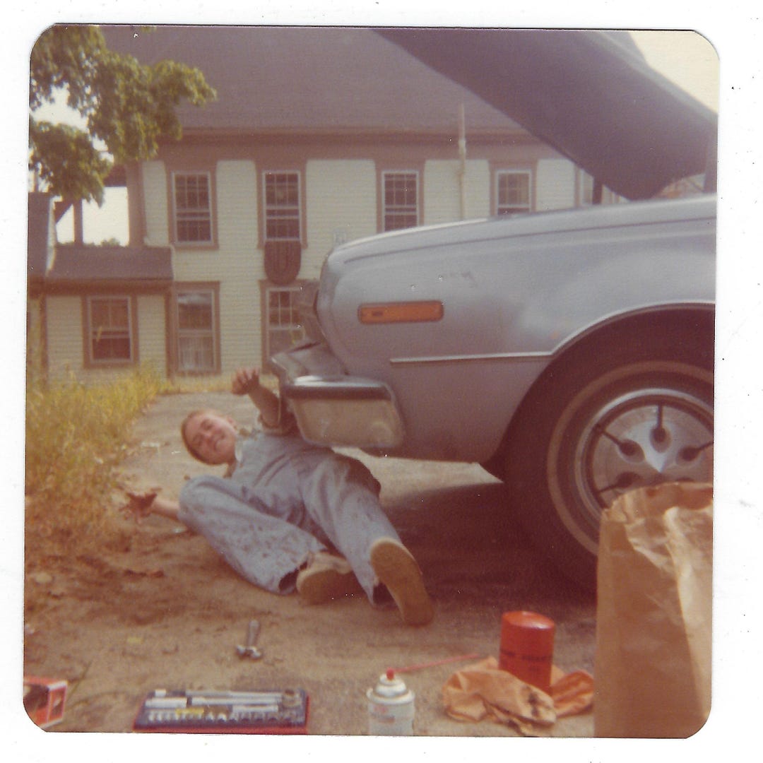 Greasy Girl Mechanic. 1980s Vintage Snapshot of a Young Woman in ...