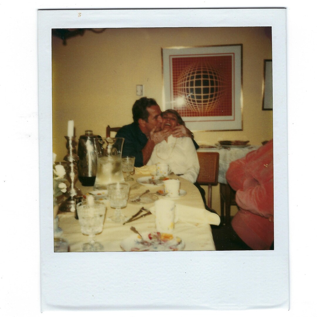 Big Smooch! 1970s Polaroid Instant Photo of a Man and Woman at a Dining ...