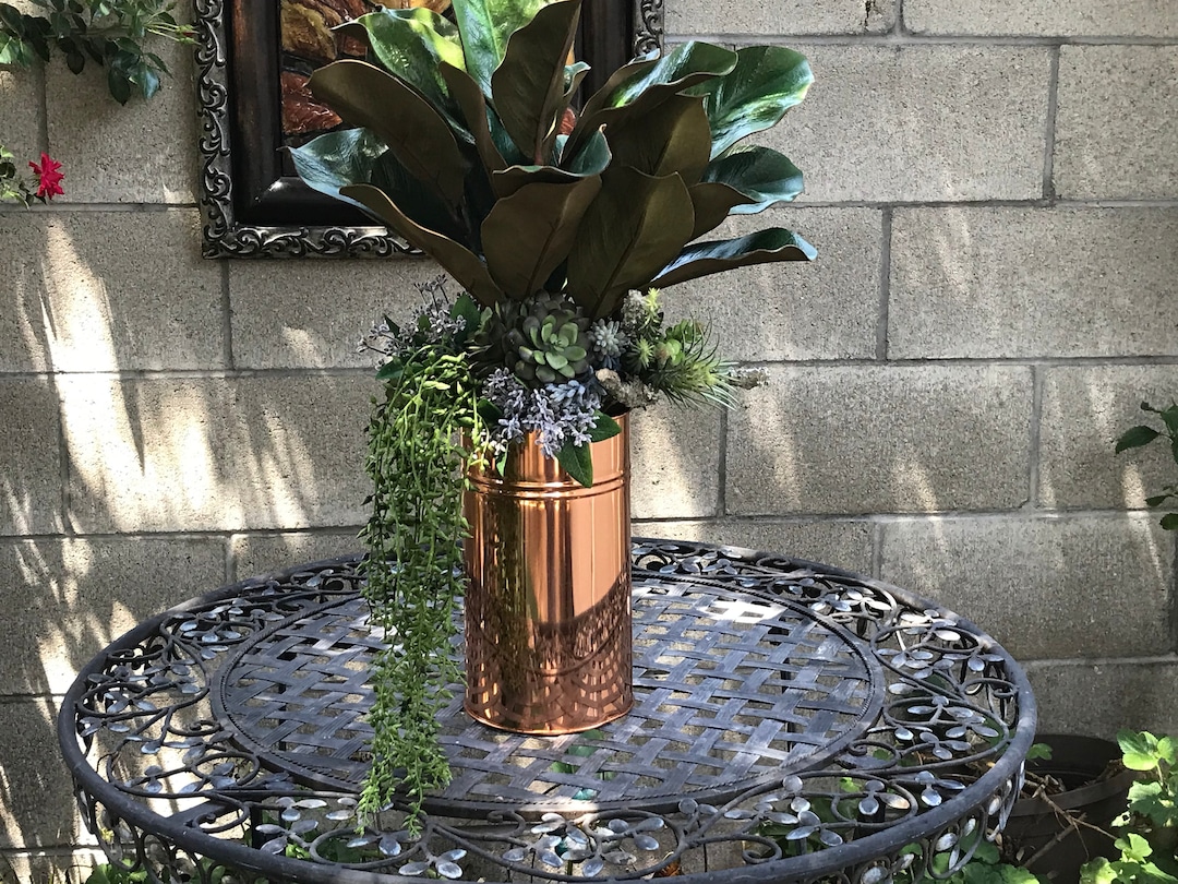 Silk Magnolias Leaves Bunch Design With Succulents on Drift Wood in A ...