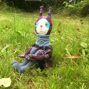 Large Cuddly Toy Made From Soft Fabric With Large Arms and Legs. A ...