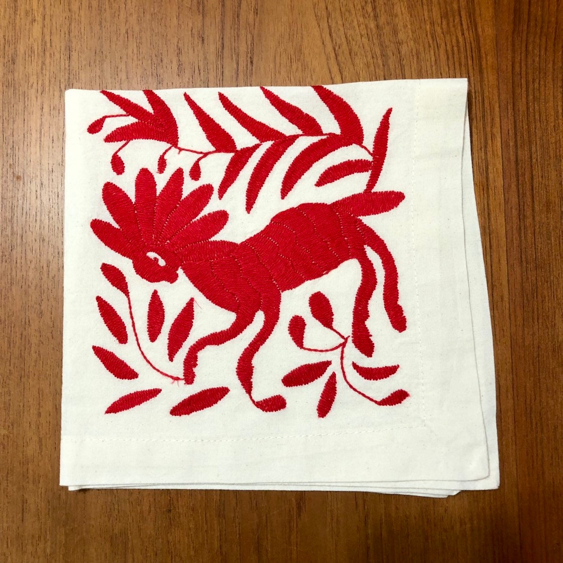 Otomi hand embroidered 19 x 19 muslin napkin with red spirit animal