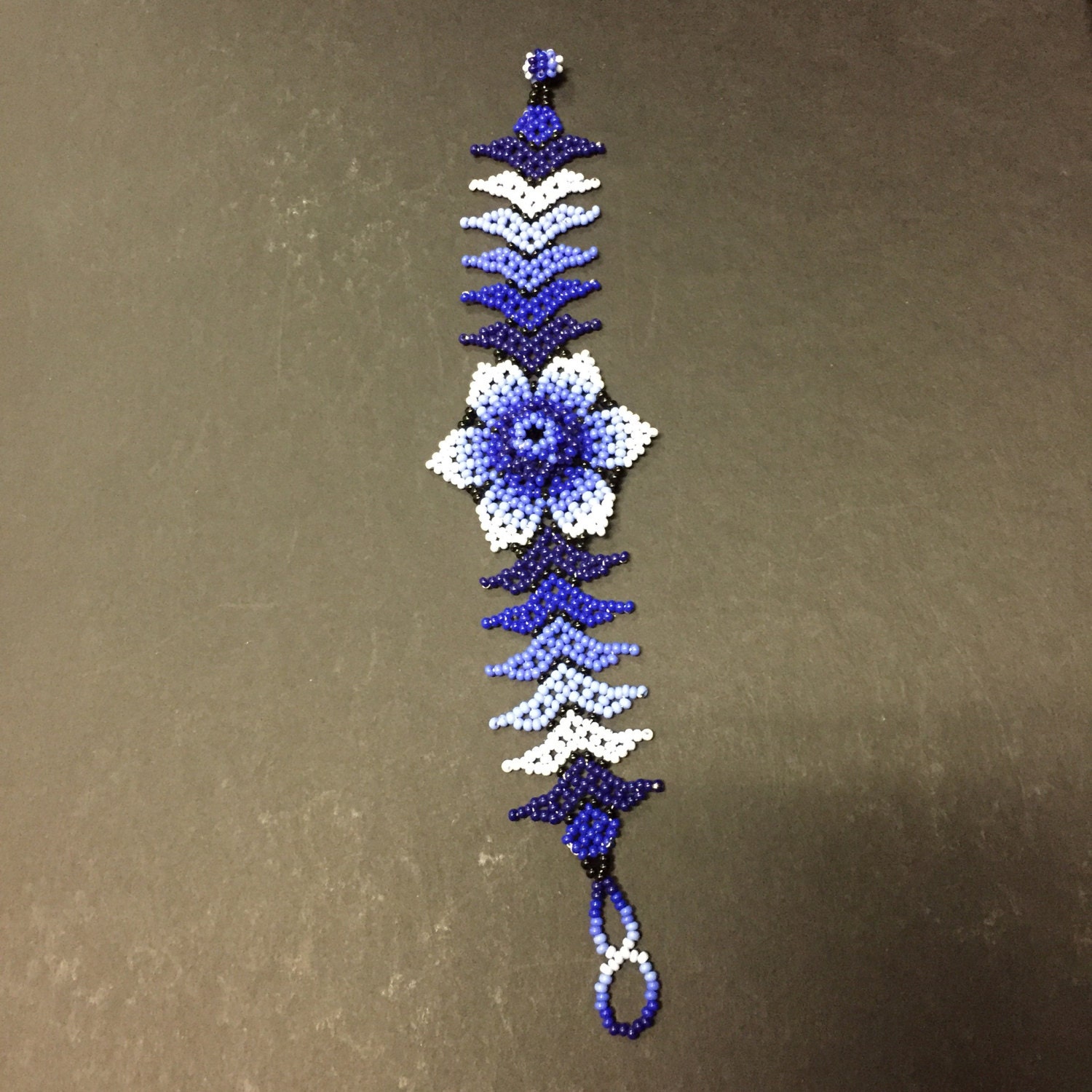 Huichol Beaded Bracelet w/ intricate blue and white flower design (6 ...