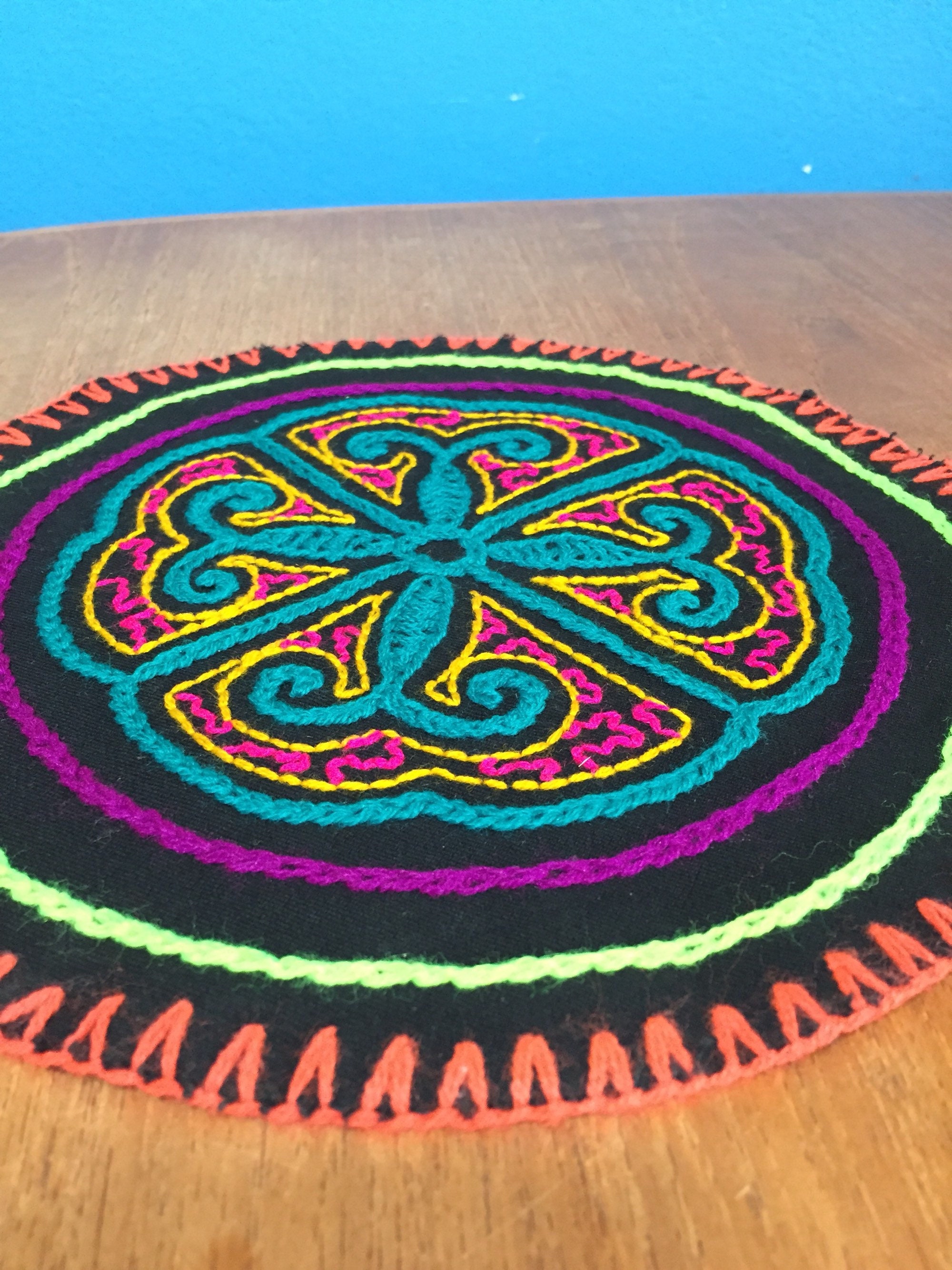 Peruvian hand embroidered round table coaster (9 diameter)
