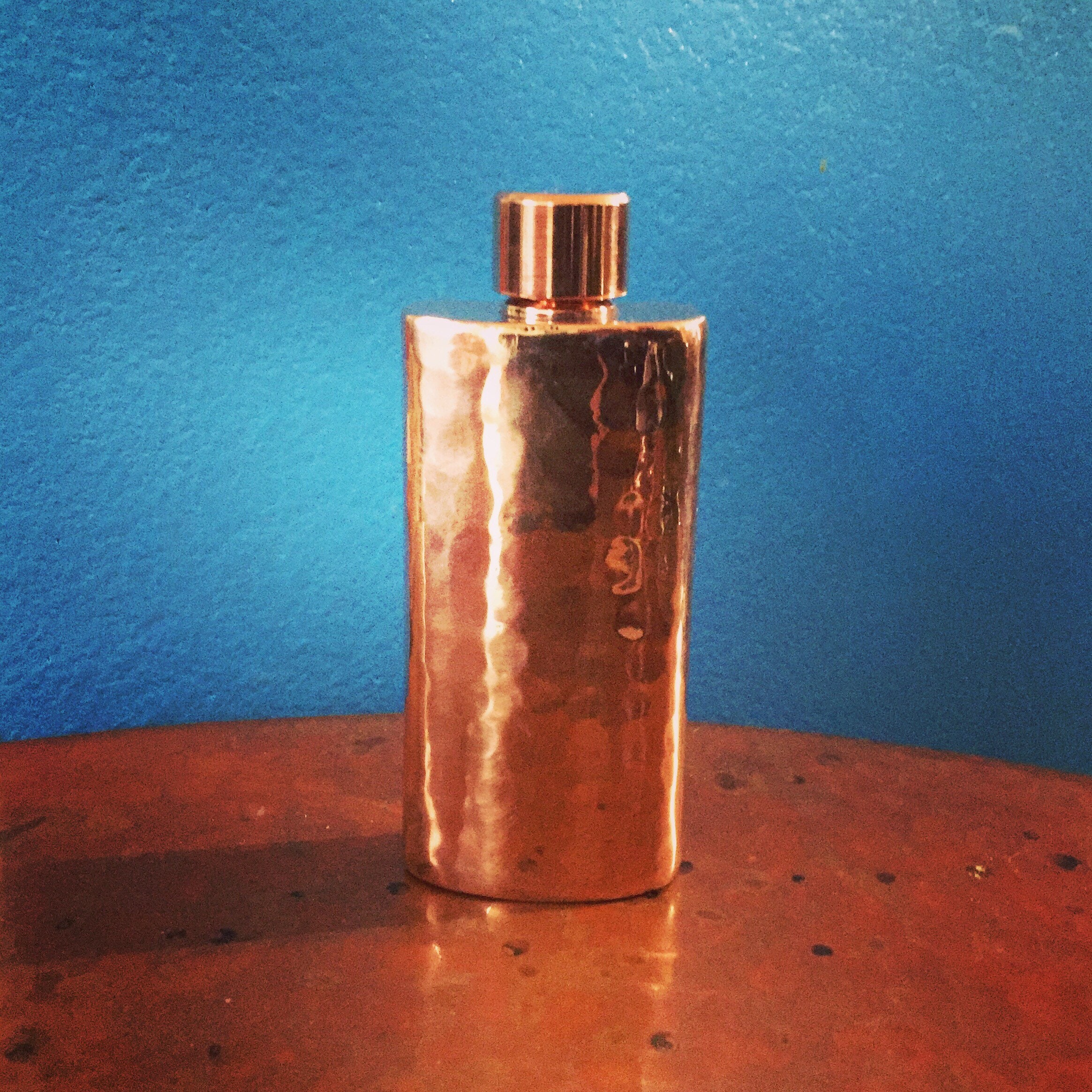 Handcrafted 4oz hammered copper flask with screwtop