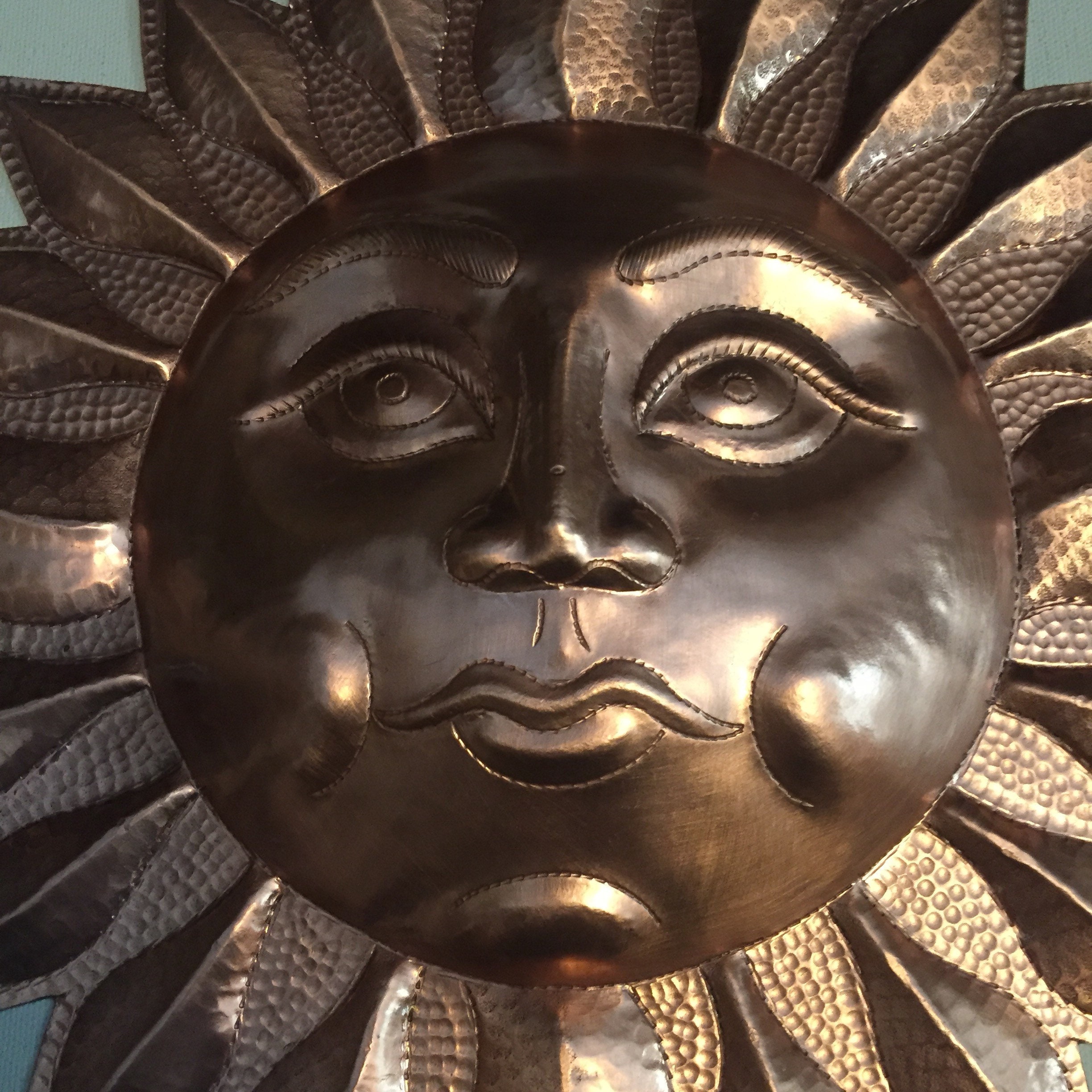 Handcrafted hammered copper 12 sun wall decor