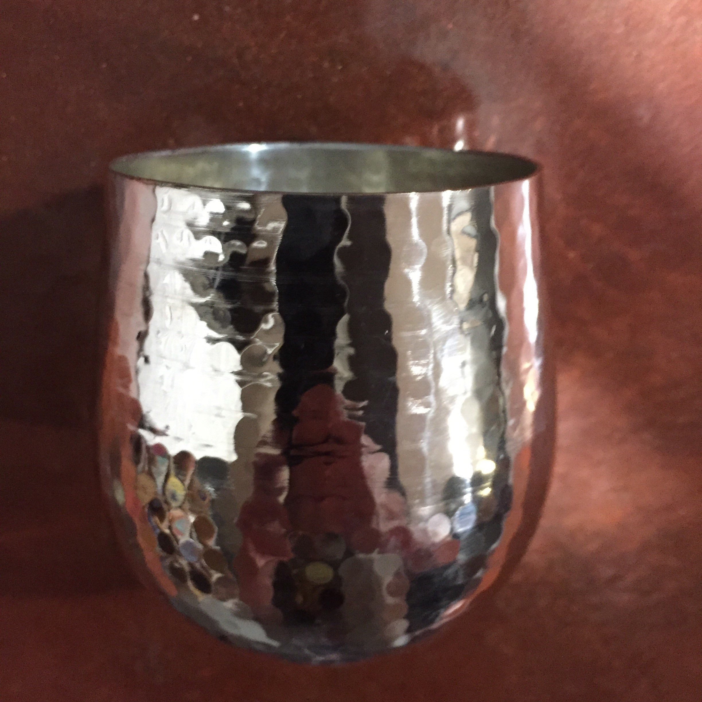 Hammered copper stemless wine glass