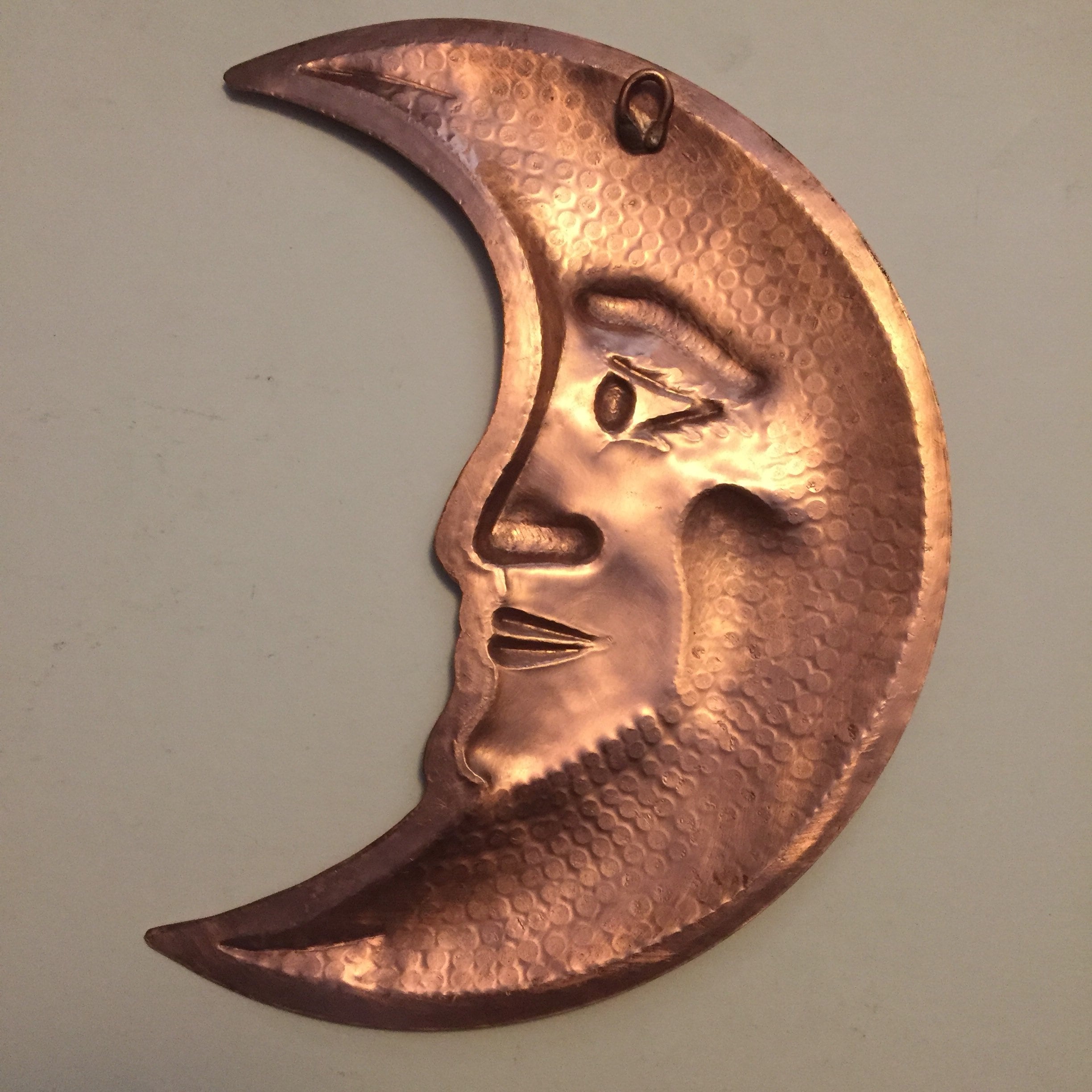 Handcrafted hammered copper 8 moon wall decor