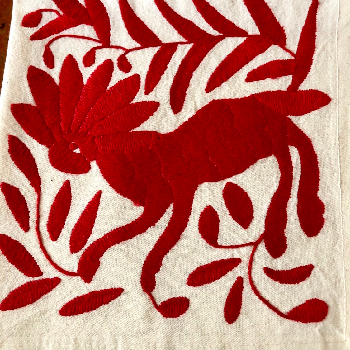 Otomi hand embroidered 19 x 19 muslin napkin with red spirit animal