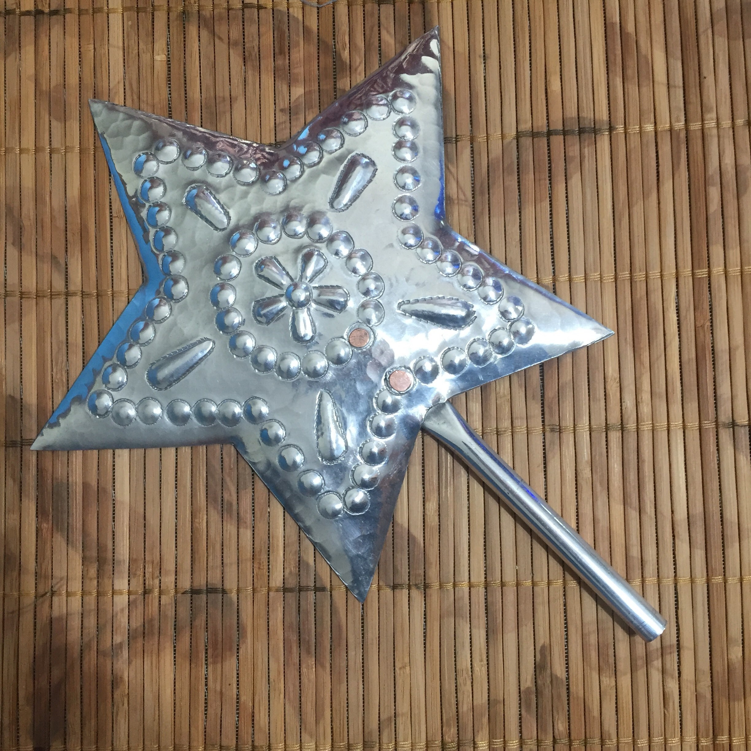 Handcrafted hammered aluminum star Christmas tree topper decoration