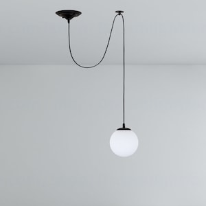 Swag Pendant Light Globe Swag Mount Pendant Lighting Sphere off Center ...