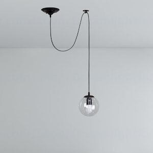 Swag Pendant Light Globe Swag Mount Pendant Lighting Sphere off Center ...