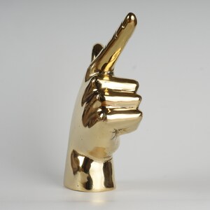 The Guns up Sign Guns Hand Sign Brass Guns Hand Sign Texas Tech Texas ...