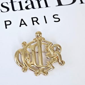 Authentic Christian Dior Gold Insignia Crest Logo Monogram Brooch Pin ...