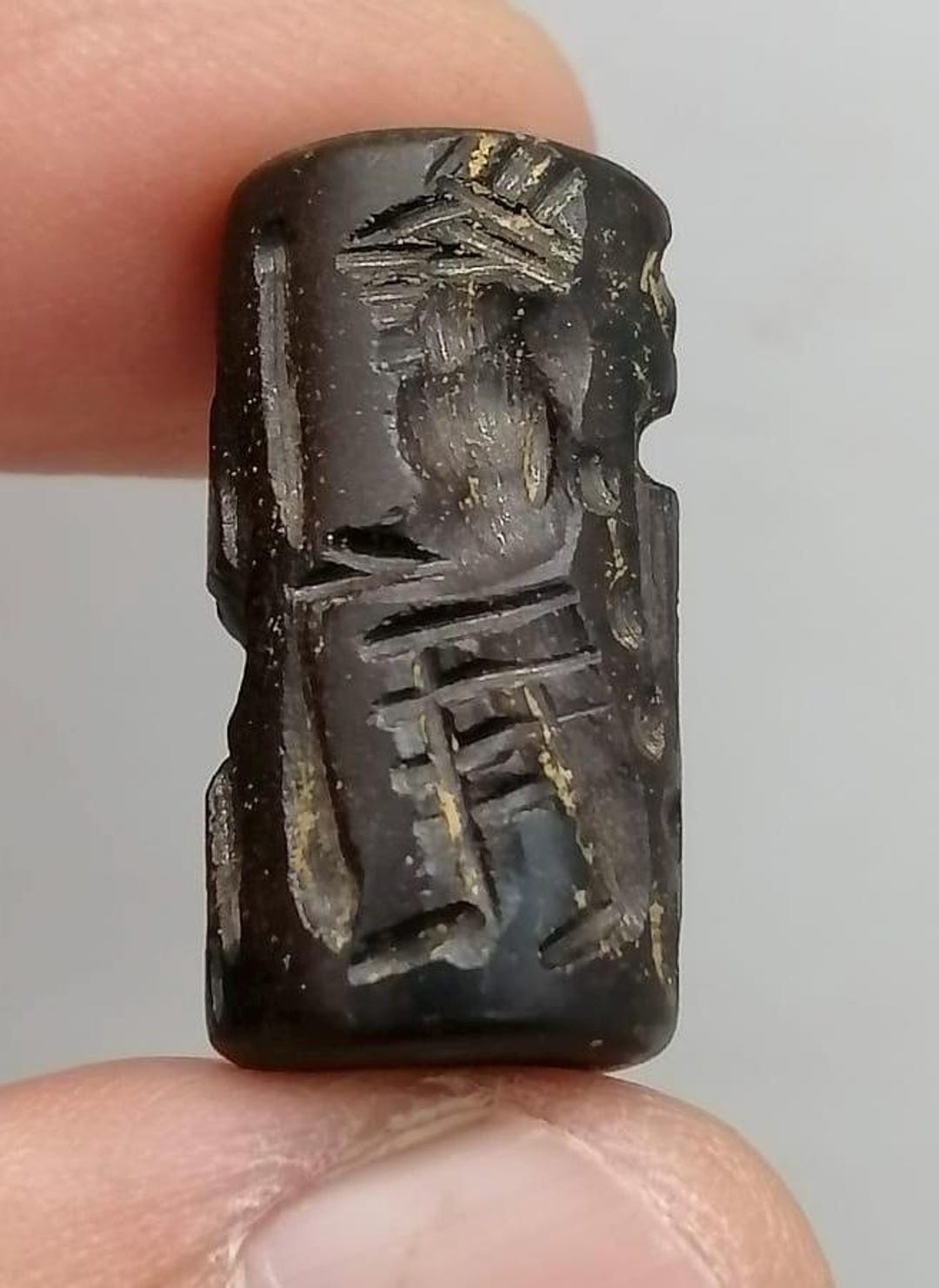 Ancient Dark Stone Cylinder Seal — Engraved Human and Animal Scene ...