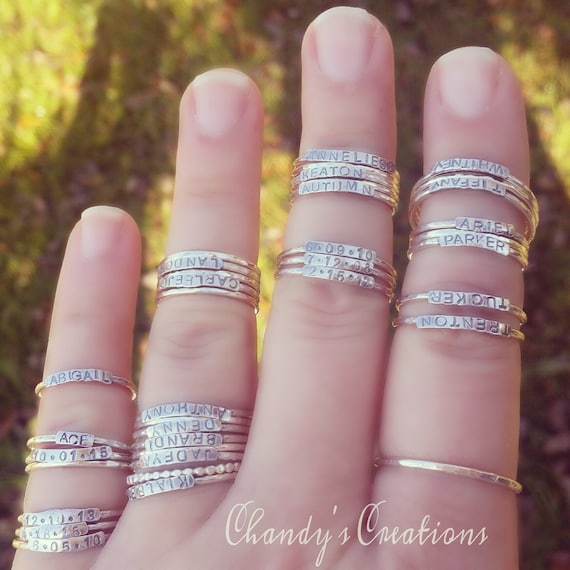 Stackable name rings with spacers store