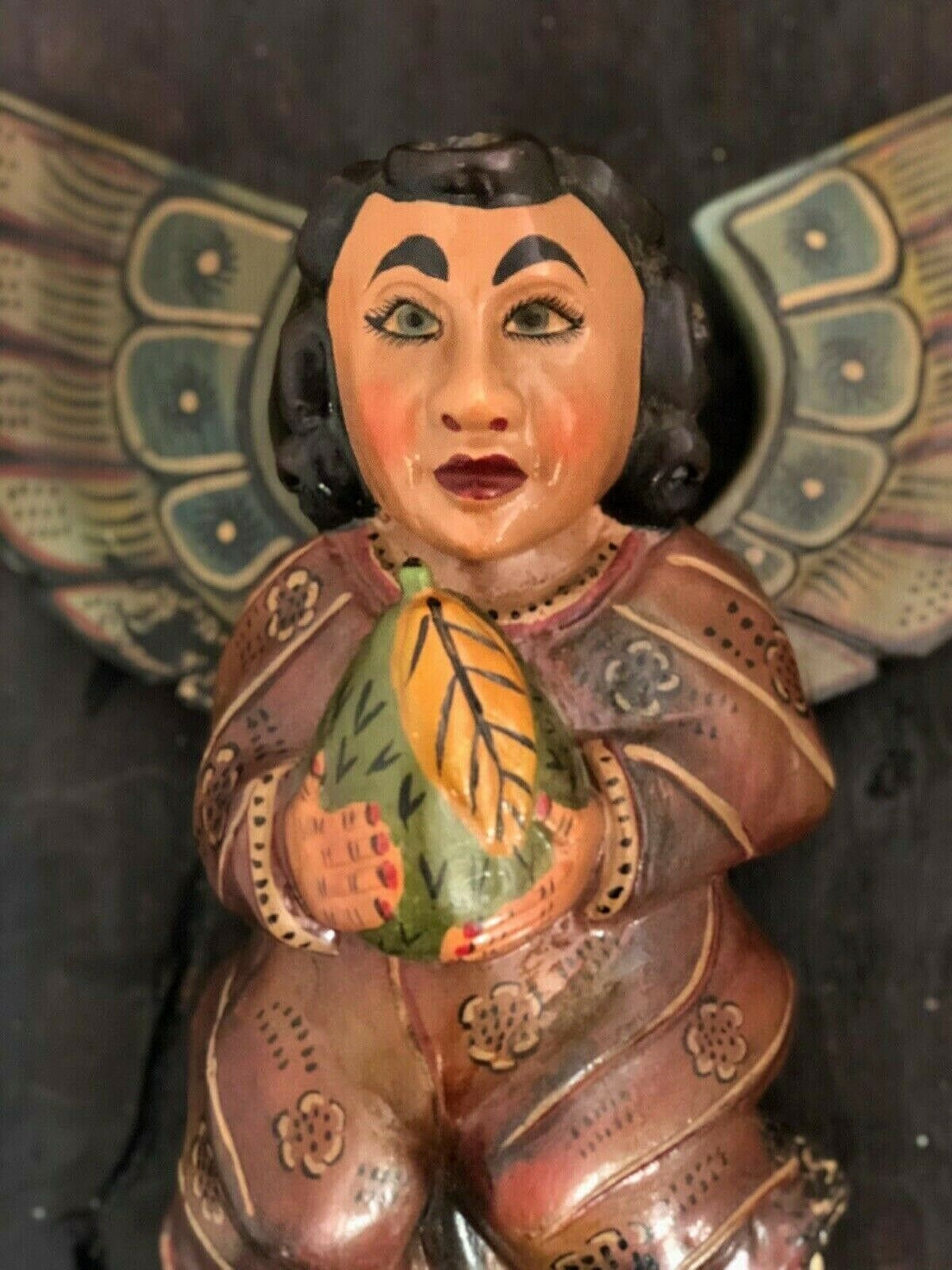 Carved Wood Angel Holding a Pear