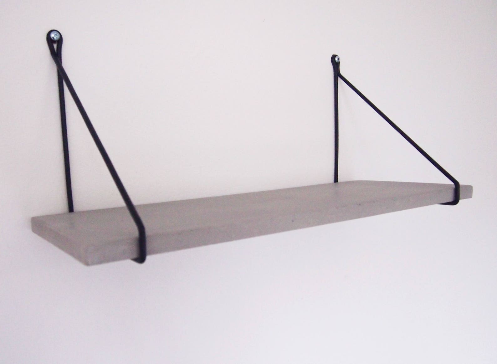 Uphangen - Rack of a Handmade Concrete Shelf Held by Two Steel Tube ...