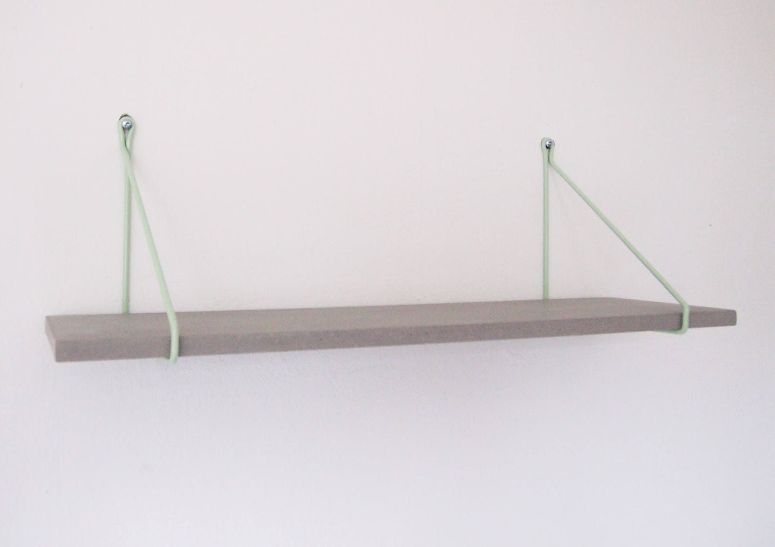 Uphangen - Rack of a Handmade Concrete Shelf Held by Two Steel Tube ...