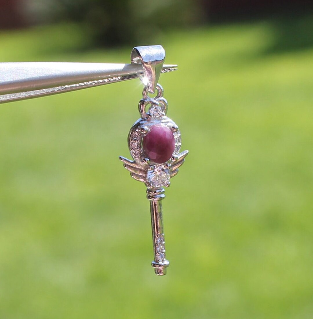 Small RUBY ANGEL WINGS Pendant W/ Silver-toned Setting W/ Flashy Clear ...