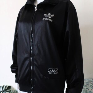 Vintage Adidas Chile 62 Shiny Black Track Top Jacket Chile '62 With Black Stripes and Silver ...