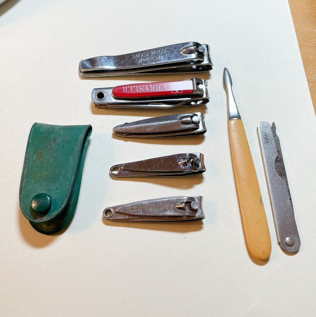 Collection of Vintage Manicure Items, Seven Pieces, Five Nail Clippers ...