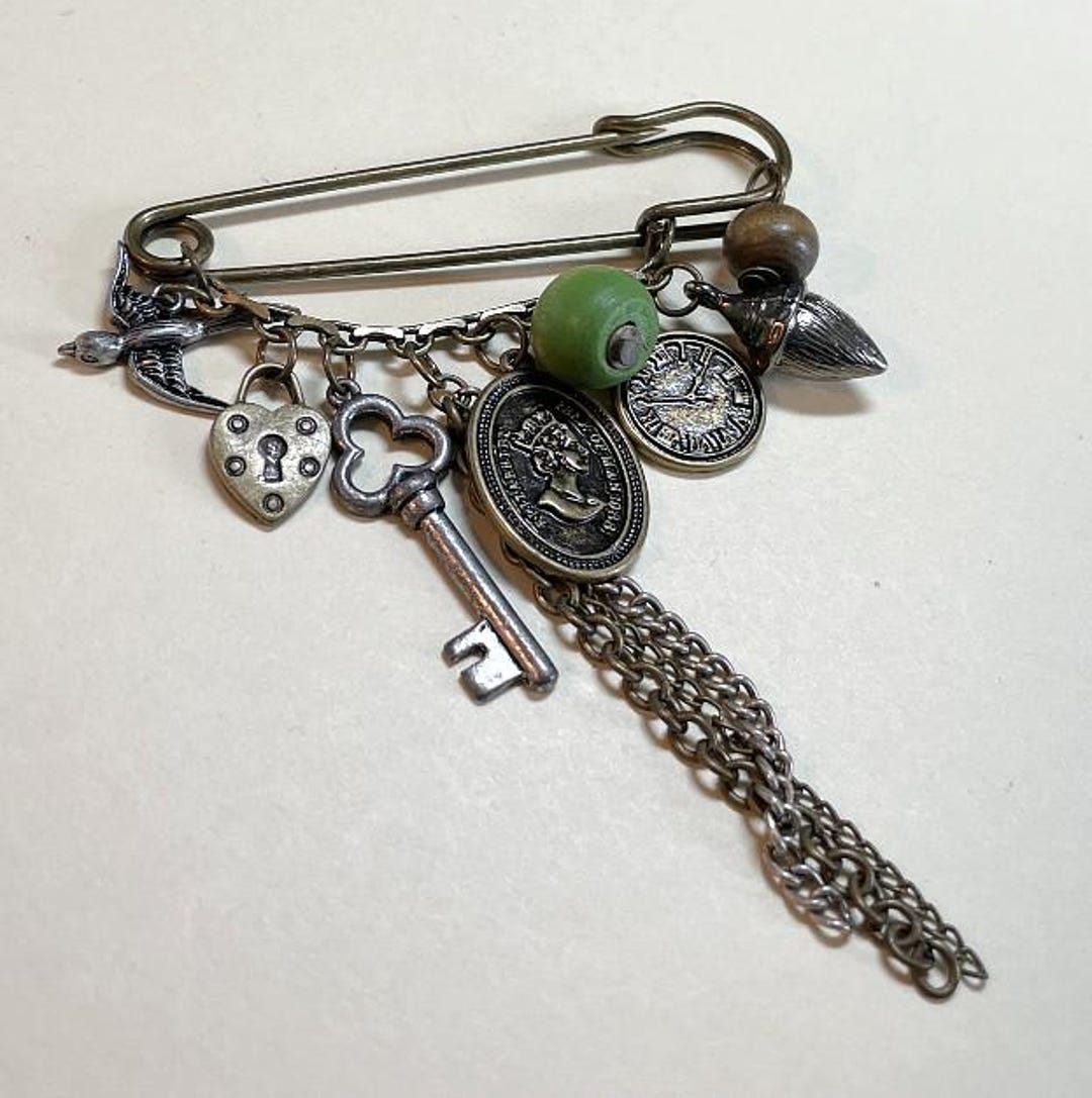 Vintage Safety Pin Style Brooch With Many Fancy Charms, Goldtone Metal ...