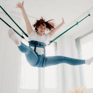 Additional Expander Cords to Increase Jumping. Kids Swing. Bungee ...