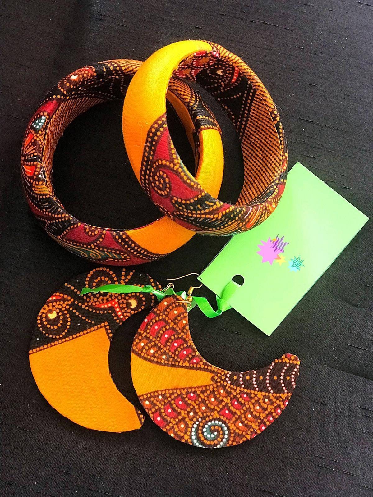 2 Chunky African wooden bangles, wrapped in cotton wool. Can be worn to ...