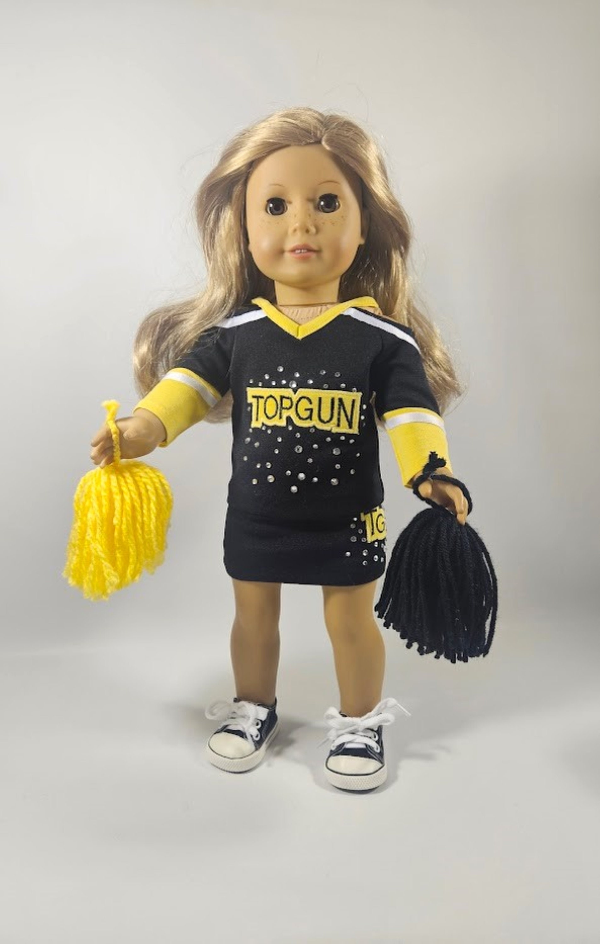 Black and Gold Cheerleading Outfit and Pom-poms or Top Gun Cheerleading ...