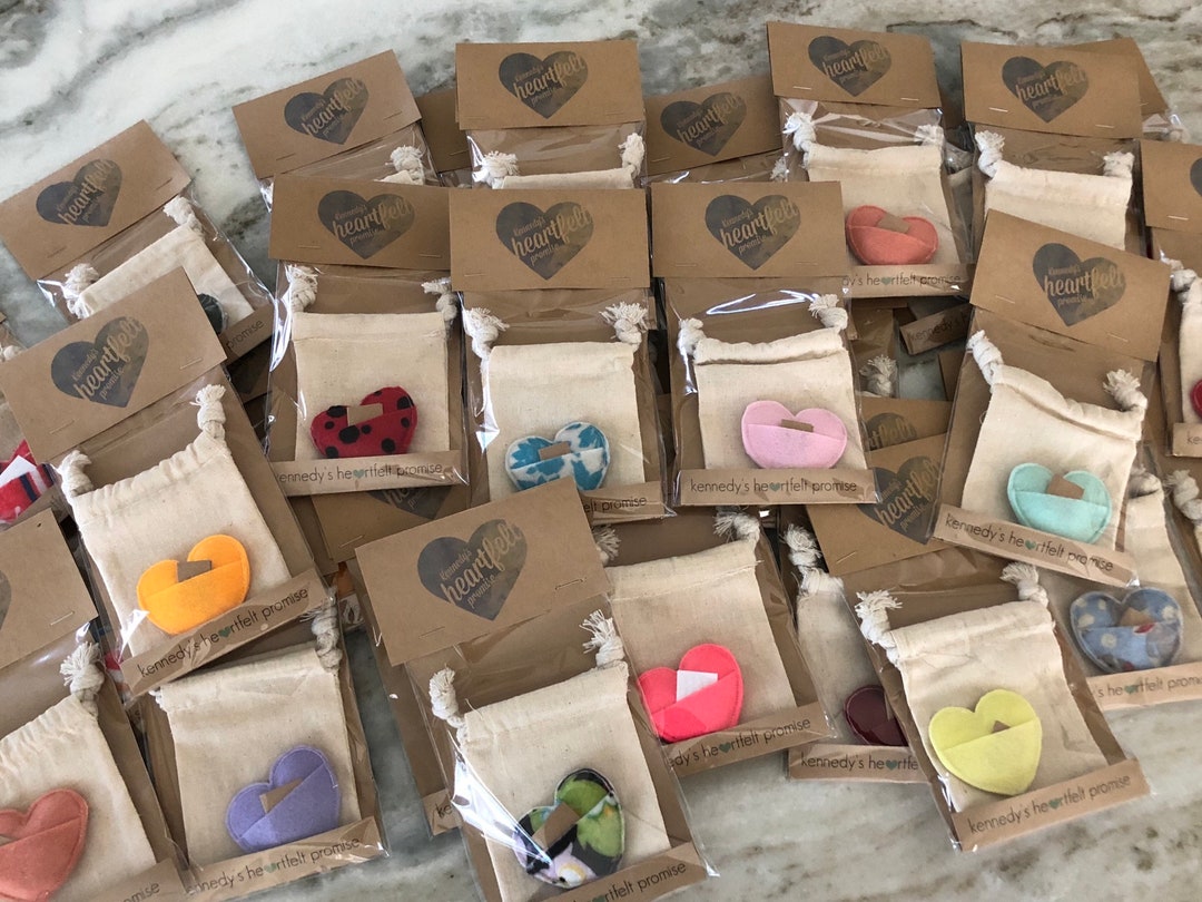 Kennedy's Heartfelt Promise: Each Handmade Felt Heart Has a Pocket for ...