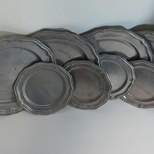 8 Piece Crown-castle Limited Pewter Dishware. 4 Dinner Plates. 4 Salad ...