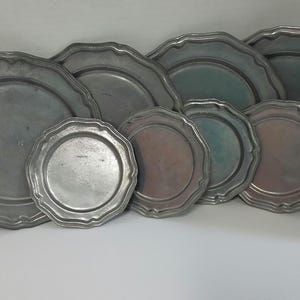 8 Piece Crown-castle Limited Pewter Dishware. 4 Dinner Plates. 4 Salad ...