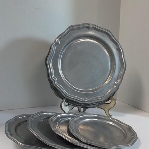 8 Piece Crown-castle Limited Pewter Dishware. 4 Dinner Plates. 4 Salad ...