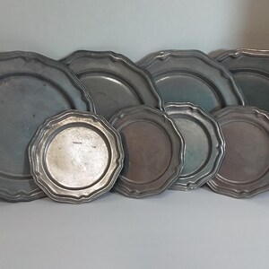 8 Piece Crown-castle Limited Pewter Dishware. 4 Dinner Plates. 4 Salad ...