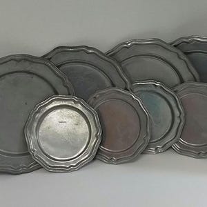 8 Piece Crown-castle Limited Pewter Dishware. 4 Dinner Plates. 4 Salad ...