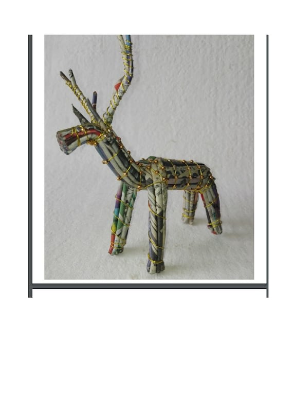 Rolled Newspaper In Hand