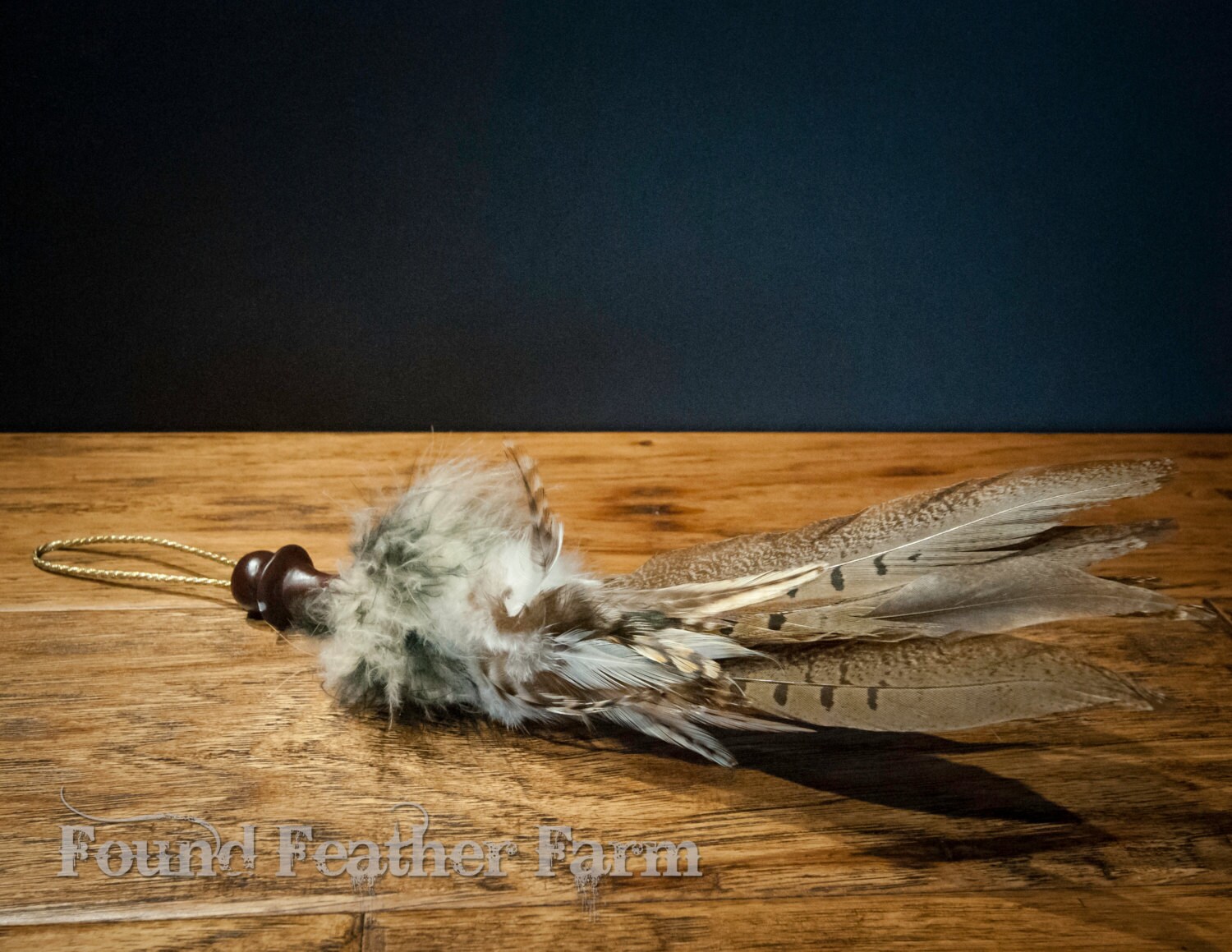 A Vintage Handmade Feather Tassel with Natural Pheasant Feathers
