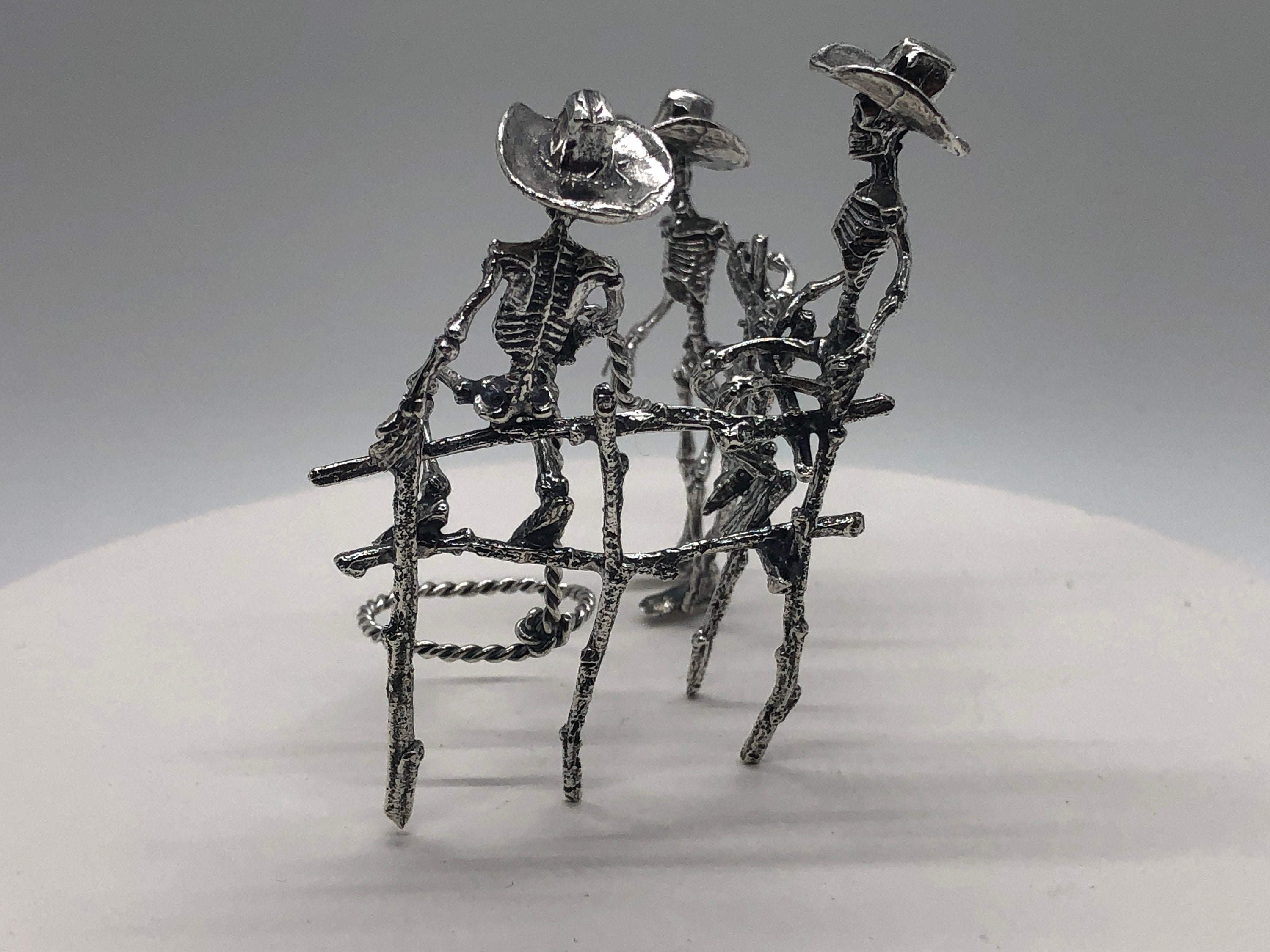 End of the Day, SS, Skeleton Sculpture Featuring Three Cowboy Slims on ...