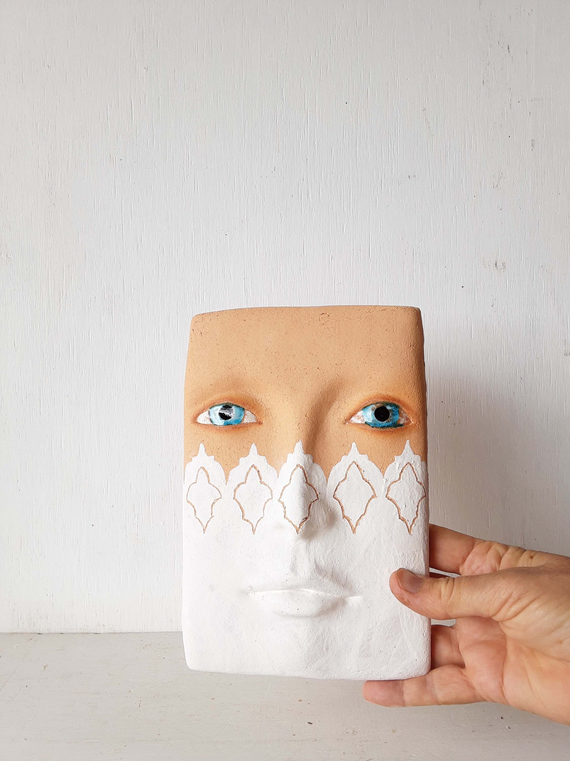 Ceramic wall sculpture pottery face with a lace pattern mask | Etsy