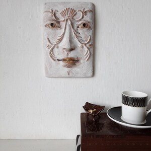 White Ceramic Tile Face Sculpture With Florentine Style Flourishes ...