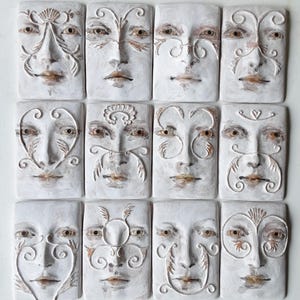 White Ceramic Tile Face Sculpture With Florentine Style Flourishes ...