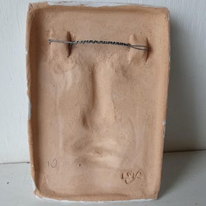 White Ceramic Tile Face Sculpture With Florentine Style Flourishes ...